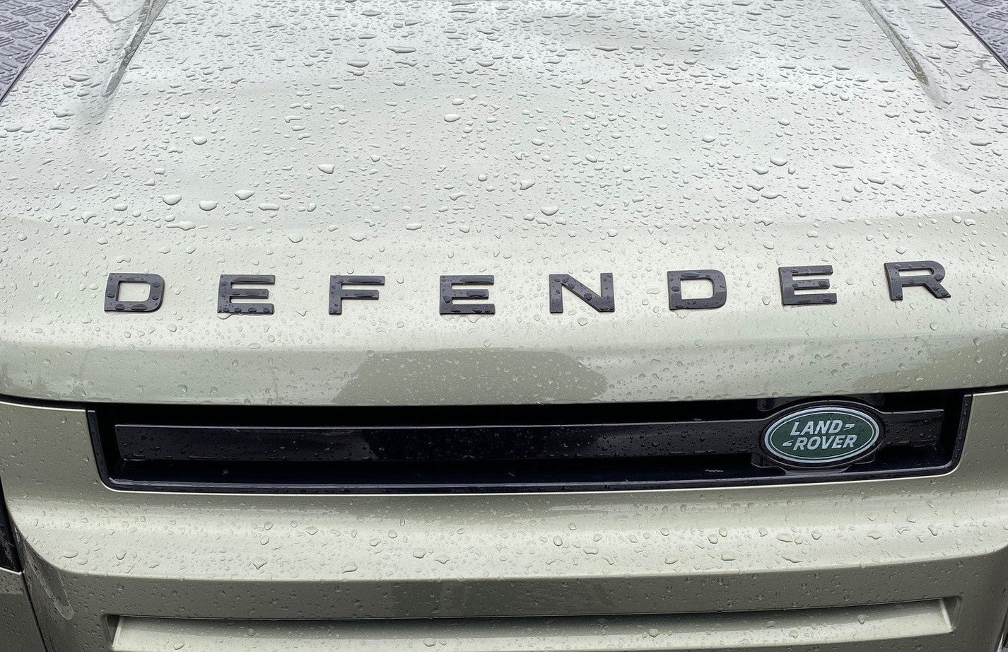Land Rover Defender Front Badge - Gloss Black – Stratstone Shop